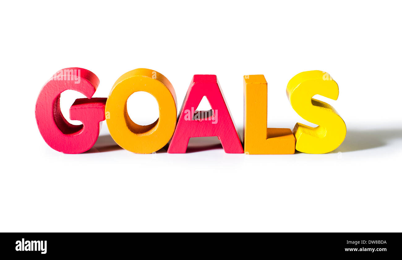 Multicolored word goals made of wood. White background Stock Photo - Alamy