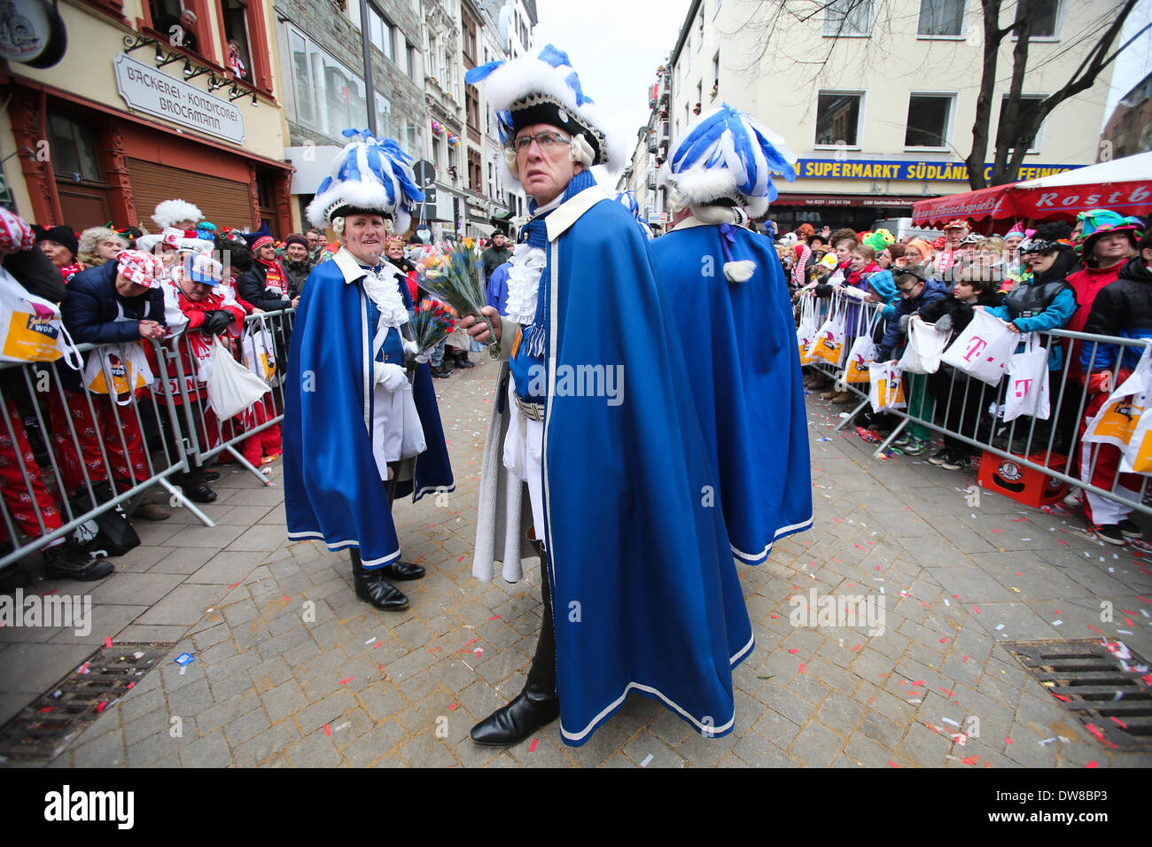 Cologne, Germany. 3rd Mar, 2014. Revelers in traditional costumes ...