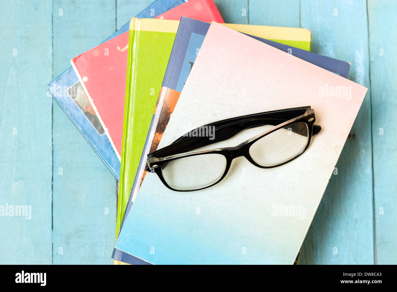 Books and Glasses Stock Photo - Alamy