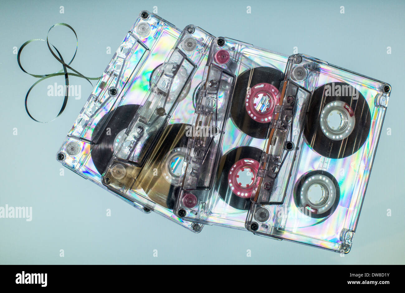 Vintage cassette tapes on light blue background Stock Photo - Alamy