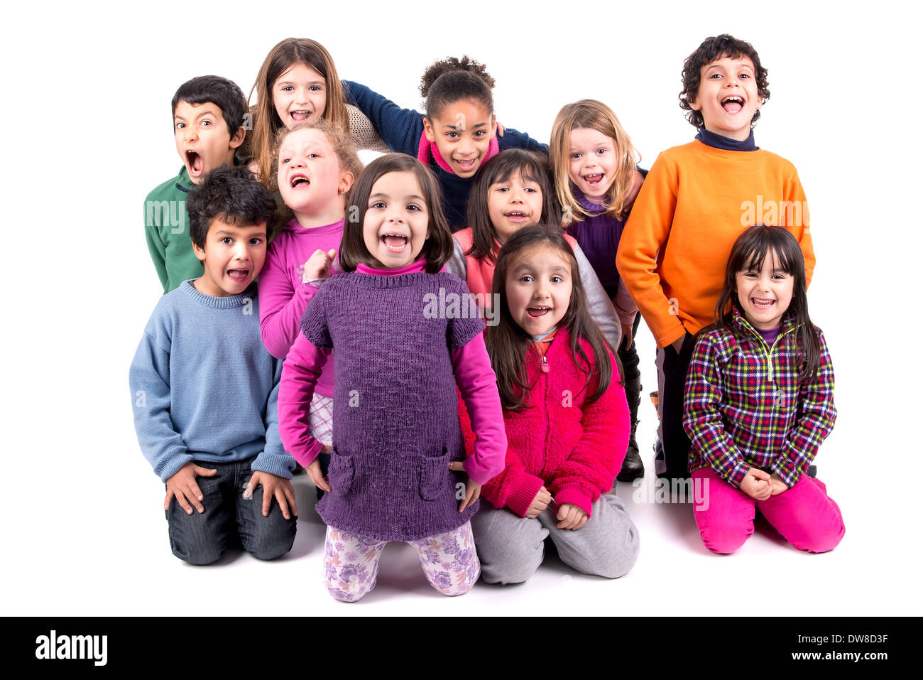 Group of children posing isolated in white Stock Photo - Alamy