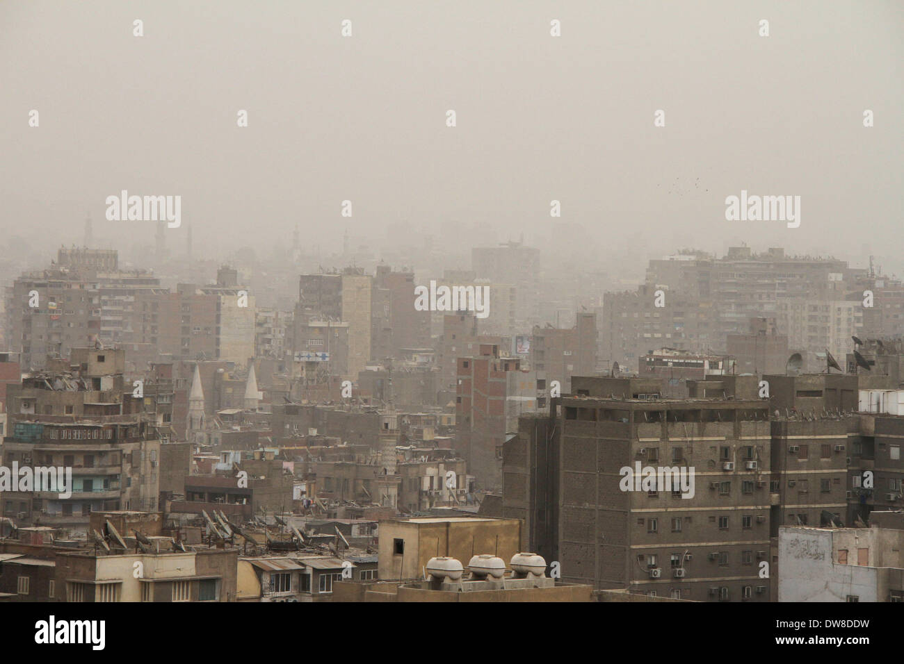 Cairo, Cairo, Egypt. 3rd Mar, 2014. Buildings are engulfed in sand ...