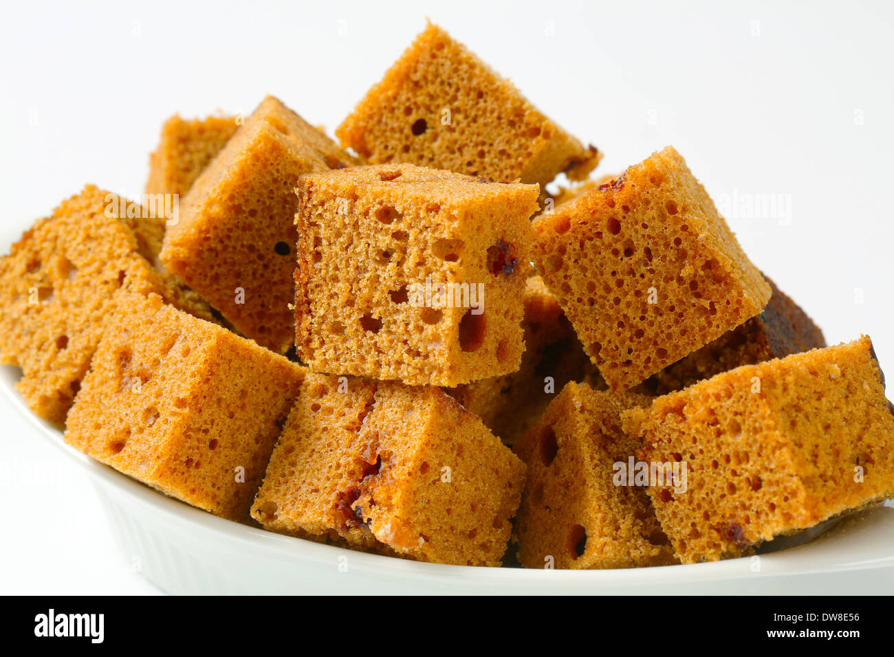Gingerbread cake cut into bite-sized squares Stock Photo - Alamy