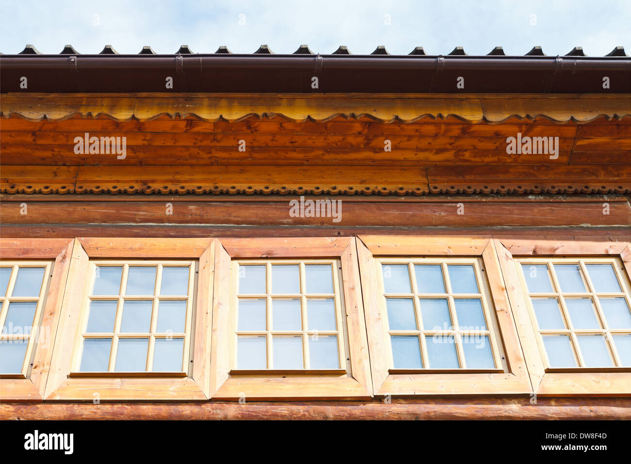 windows of wooden log tower of Great Wooden Palace in russian village ...