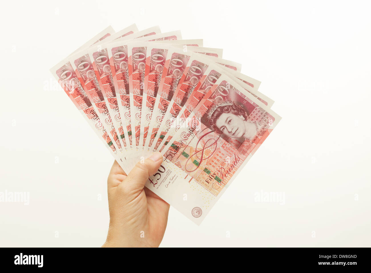 Fan of Fifty Pound Notes with Hand Stock Photo - Alamy