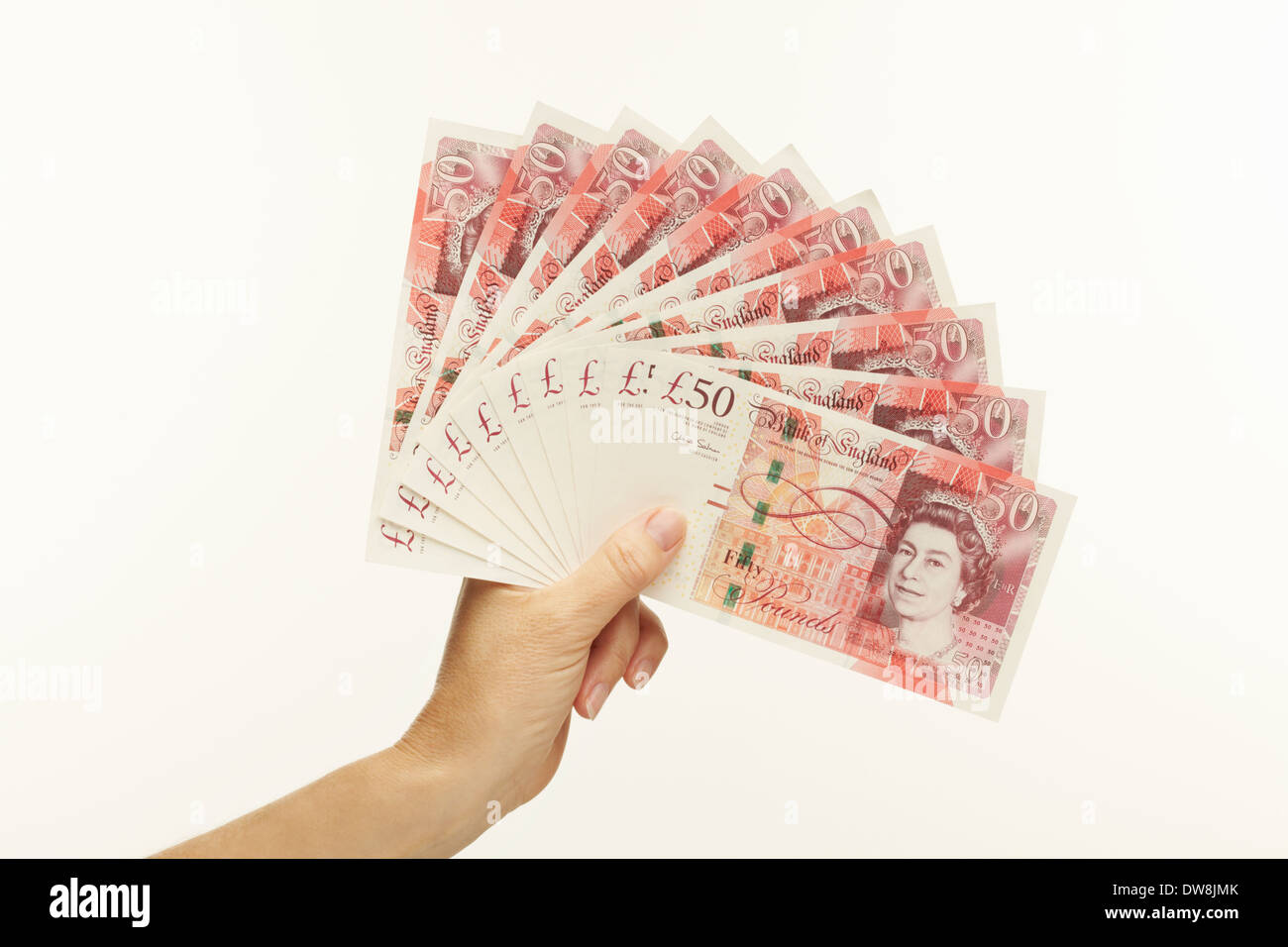 Fan of Fifty Pound Notes with Hand Stock Photo - Alamy