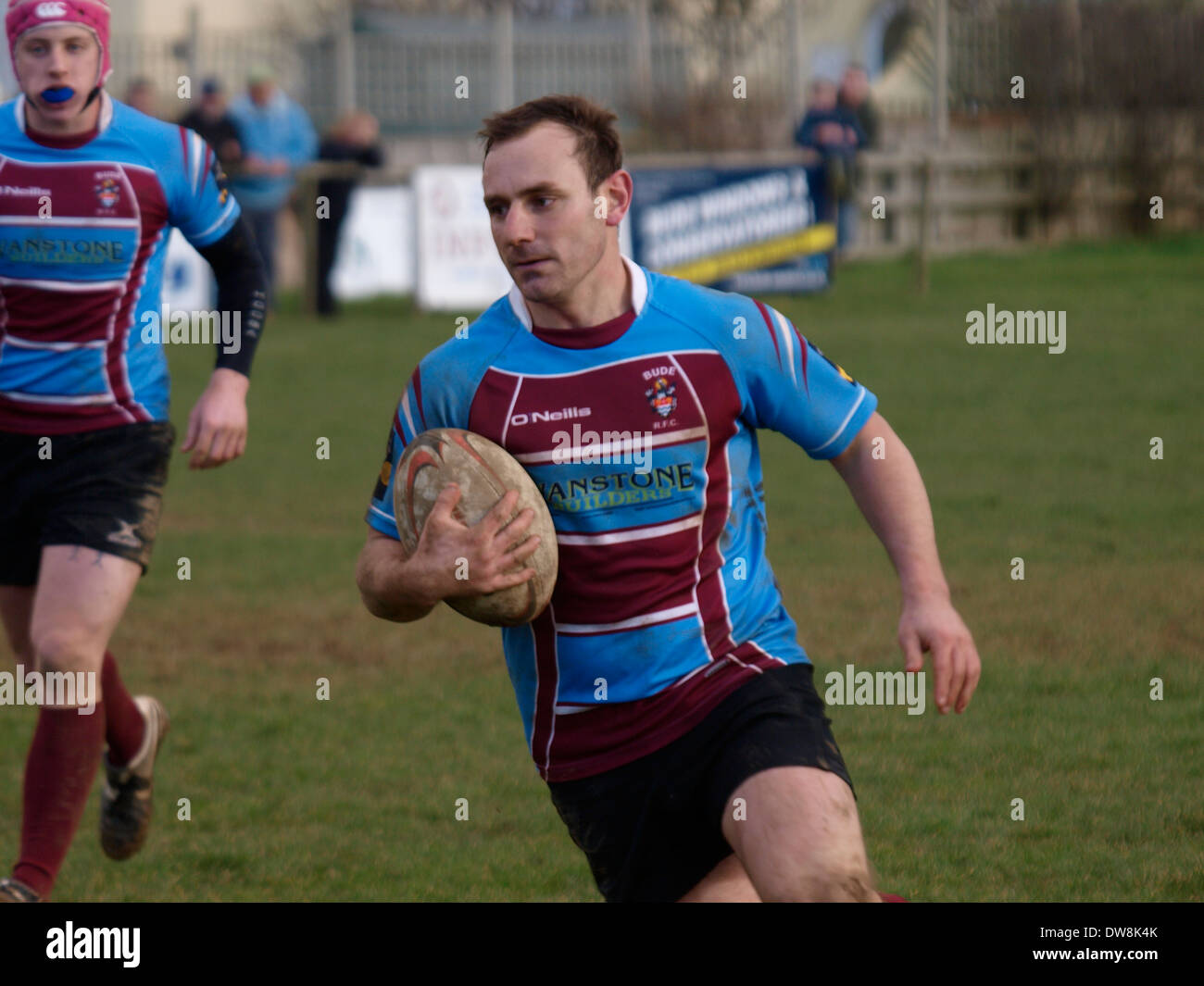 Man running with rugby ball hi-res stock photography and images - Alamy