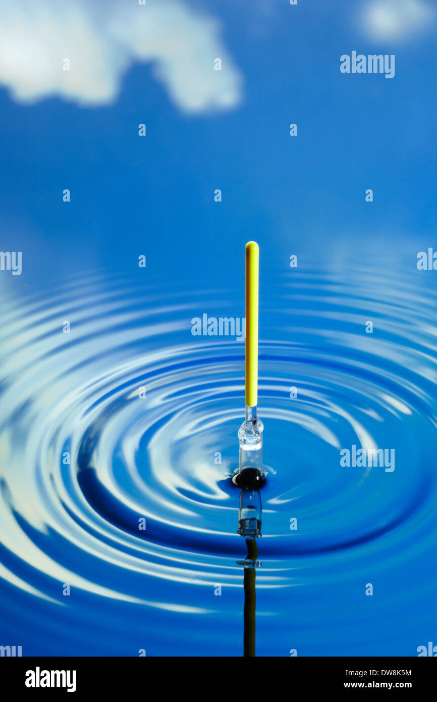 Fishing Float in Water Stock Photo - Alamy