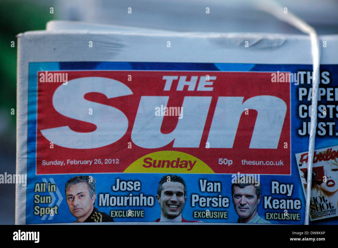First copies of the new newspaper The Sun on Sunday are seen along side ...
