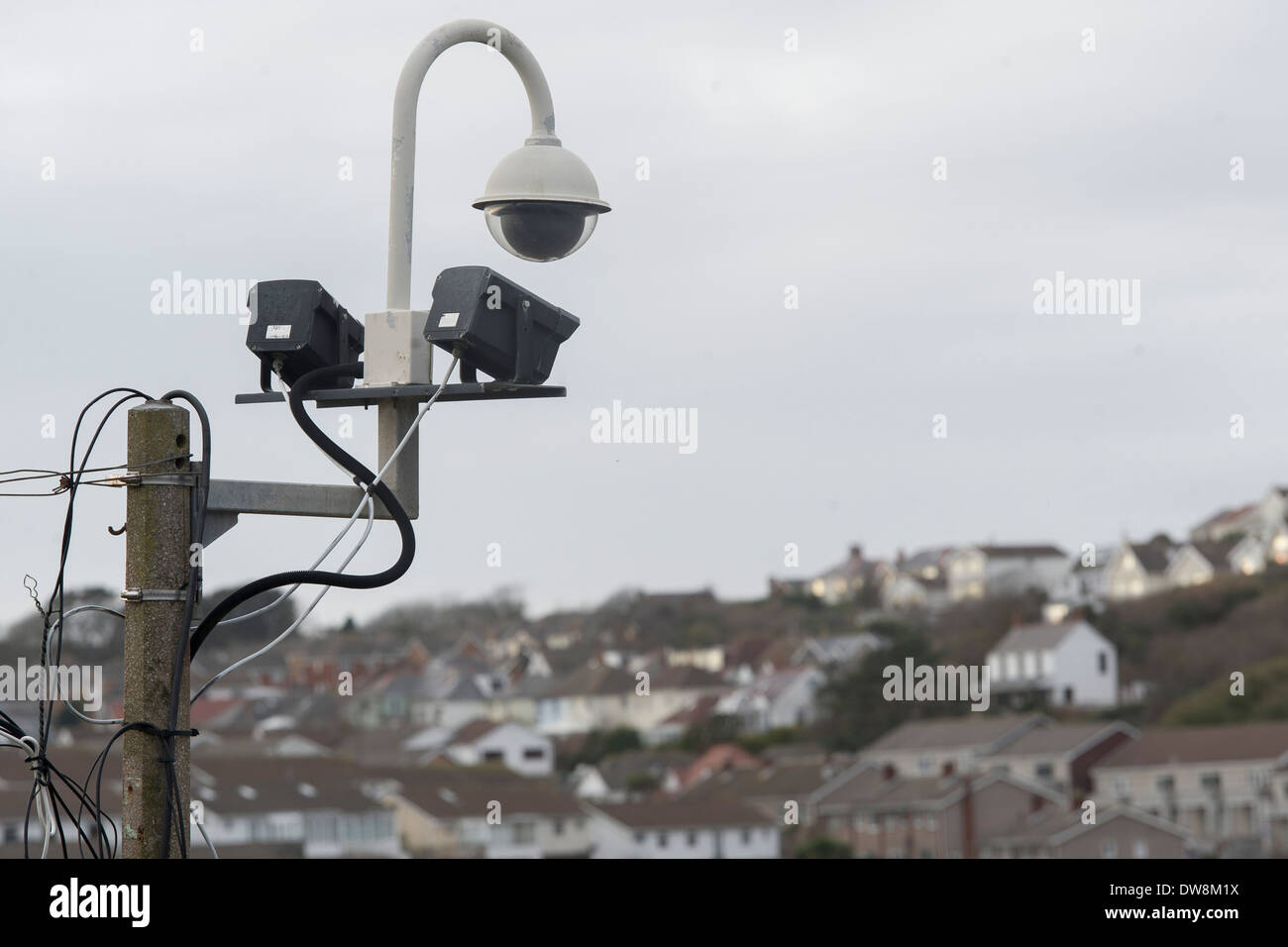 A CCTV security camera overlooking a residential area Stock Photo - Alamy