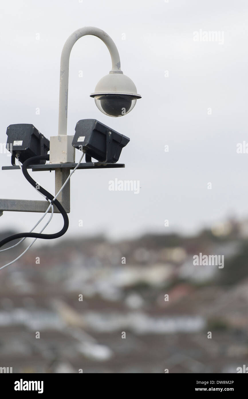 A CCTV security camera overlooking a residential area Stock Photo - Alamy