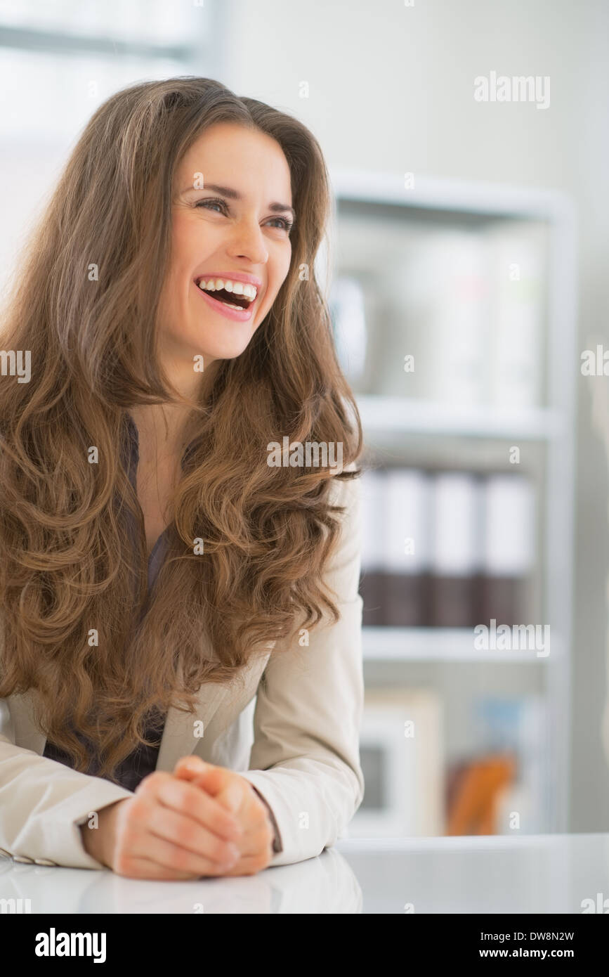Principal sitting smiling hi-res stock photography and images - Alamy