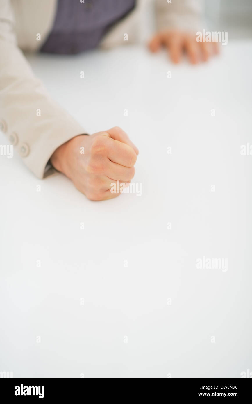 Closeup on business woman knocking on table with fist Stock Photo - Alamy