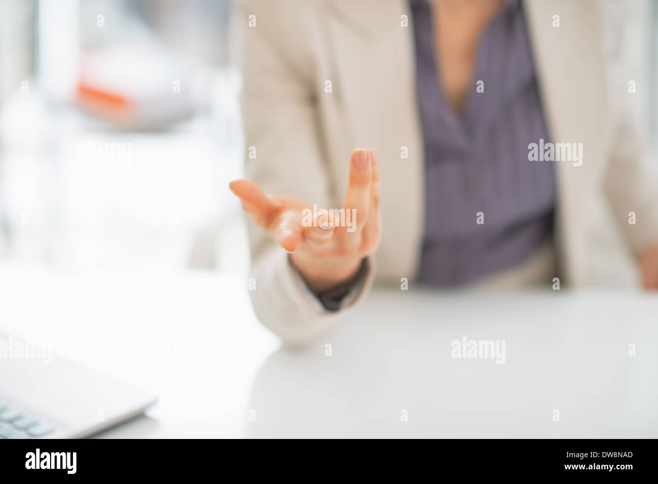 Closeup on business woman explaining something Stock Photo - Alamy