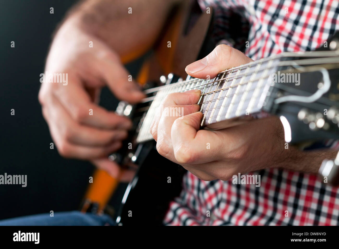 Mans hands playing electric guitar hi-res stock photography and images ...