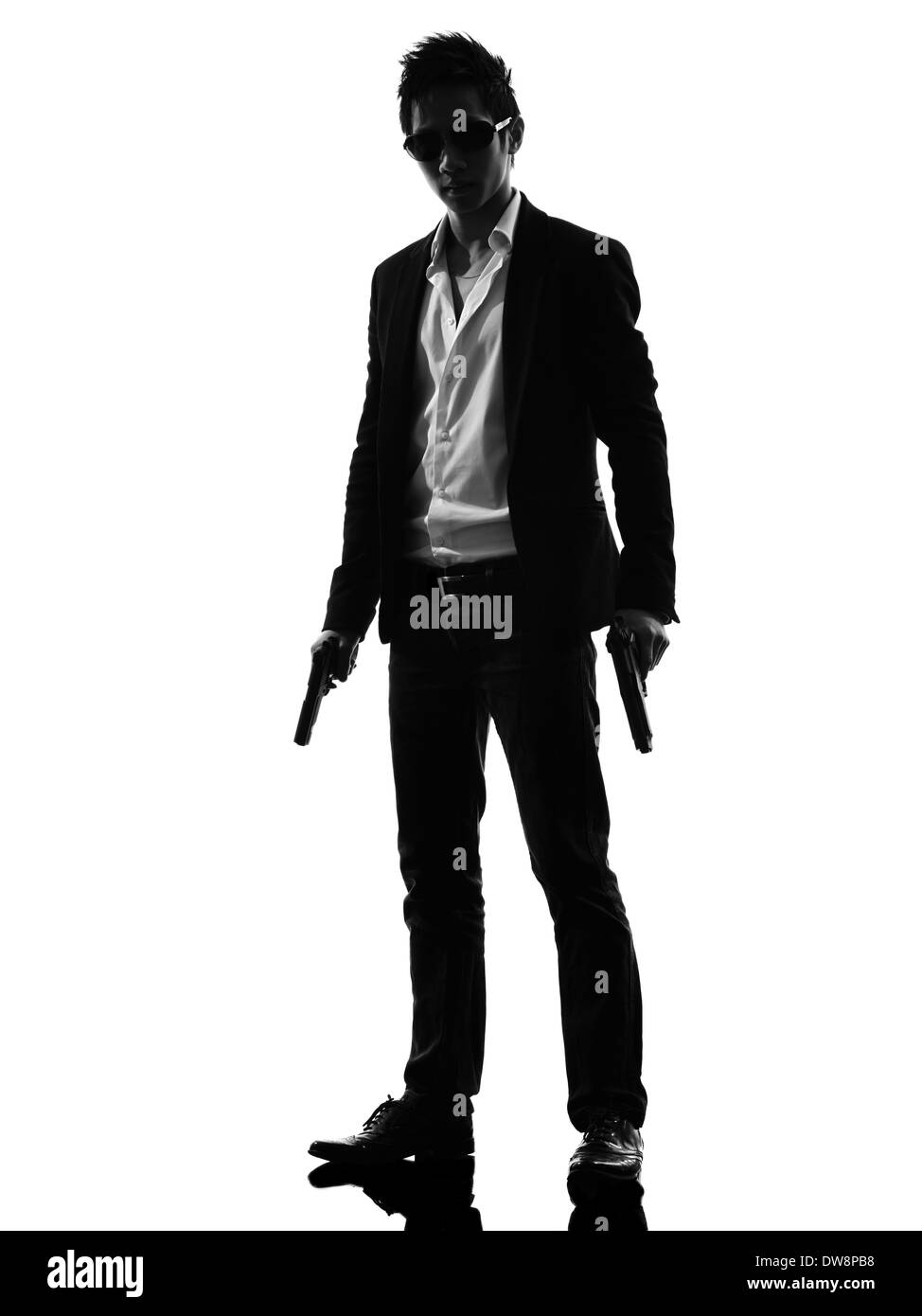 one asian gunman killer standing in silhouette isolated white ...