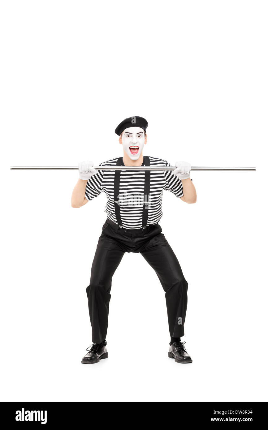 Full length portrait of mime artist holding a big metal pipe Stock ...