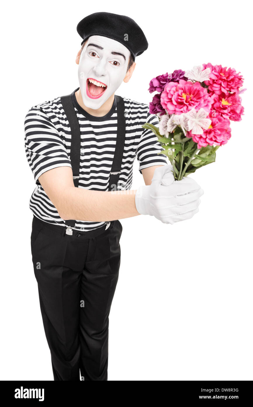 Male mime artist holding a bouquet of flowers Stock Photo - Alamy