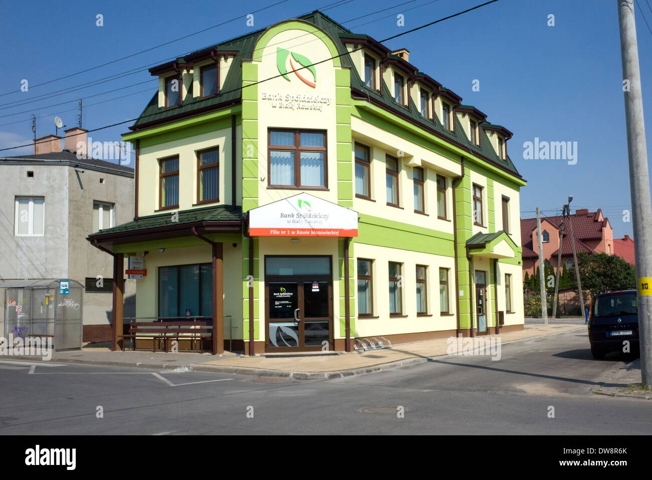 Beautiful Polish commercial building on corner white exterior with lime ...