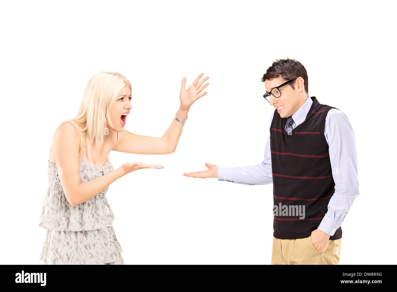 Young couple arguing isolated on white background Stock Photo - Alamy