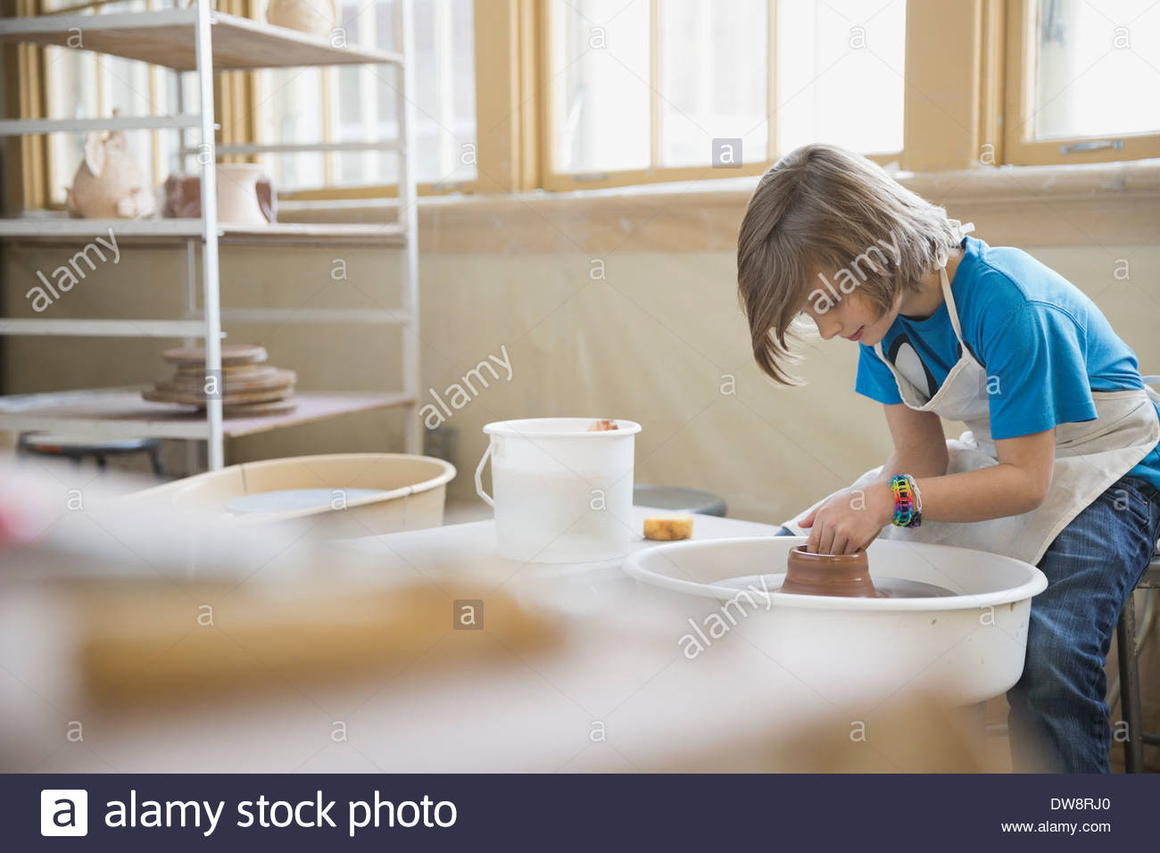 Boy pottery clay hi-res stock photography and images - Alamy