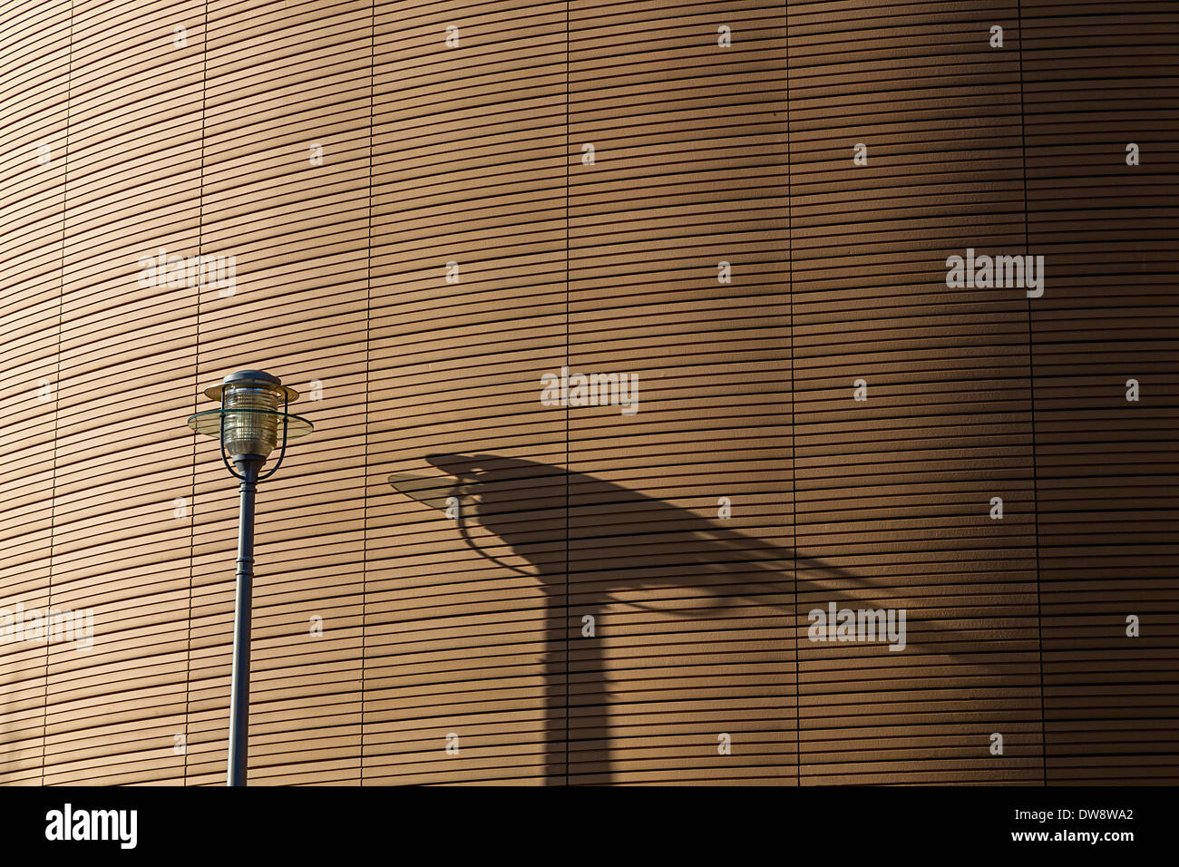 shadow of a street light on a patterned wall Stock Photo - Alamy
