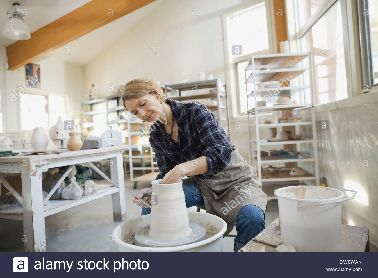 Clay on potters wheel hi-res stock photography and images - Alamy