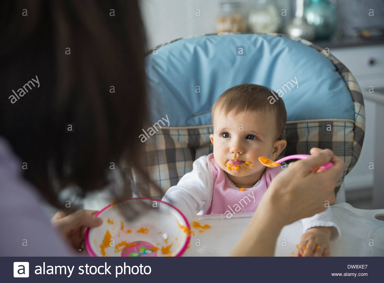 Baby being fed food hi-res stock photography and images - Alamy