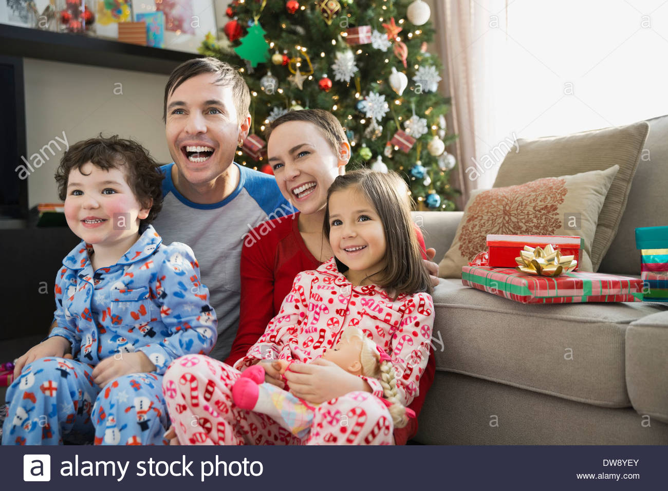 Family father christmas hi-res stock photography and images - Alamy