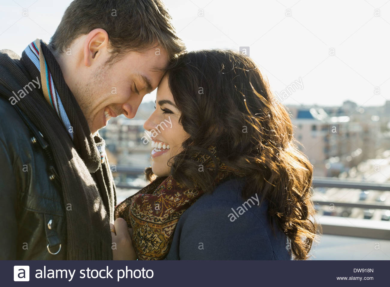 Couple standing outdoors hi-res stock photography and images - Alamy