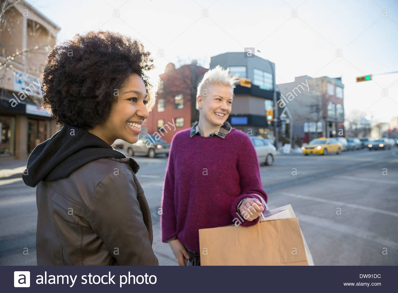 Friends shopping together Stock Photo - Alamy