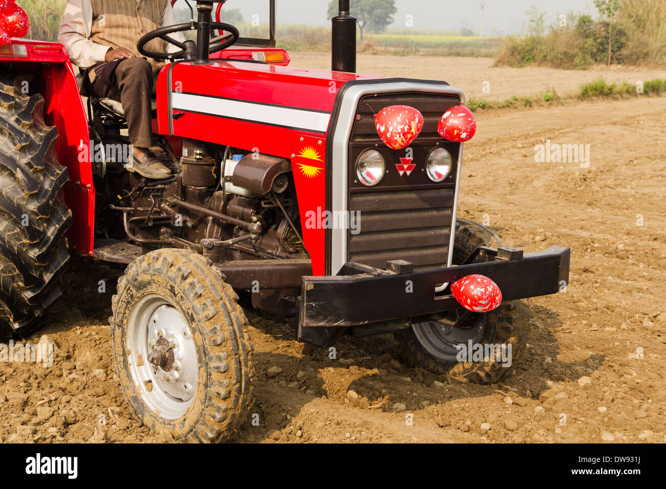 1 Indian farmer driving tractor in Plowed field Stock Photo - Alamy