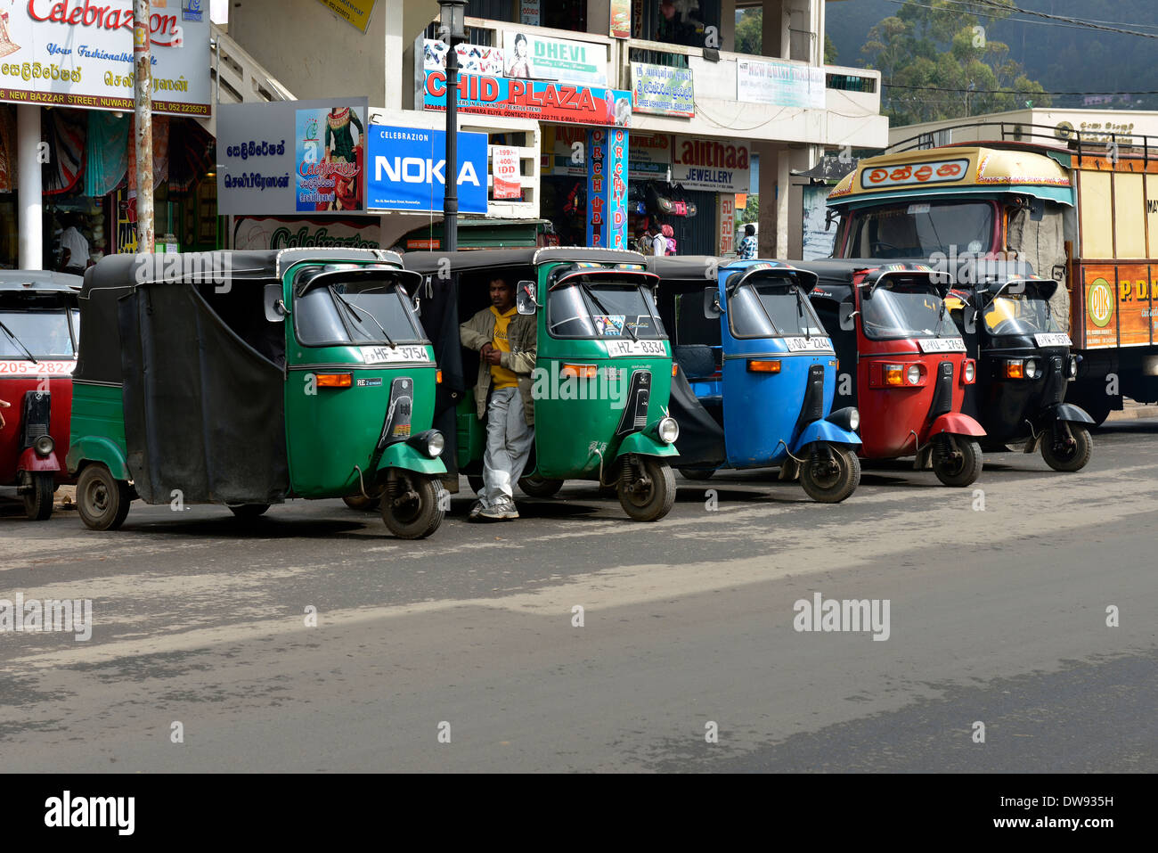 Three wheeled taxi hi-res stock photography and images - Alamy