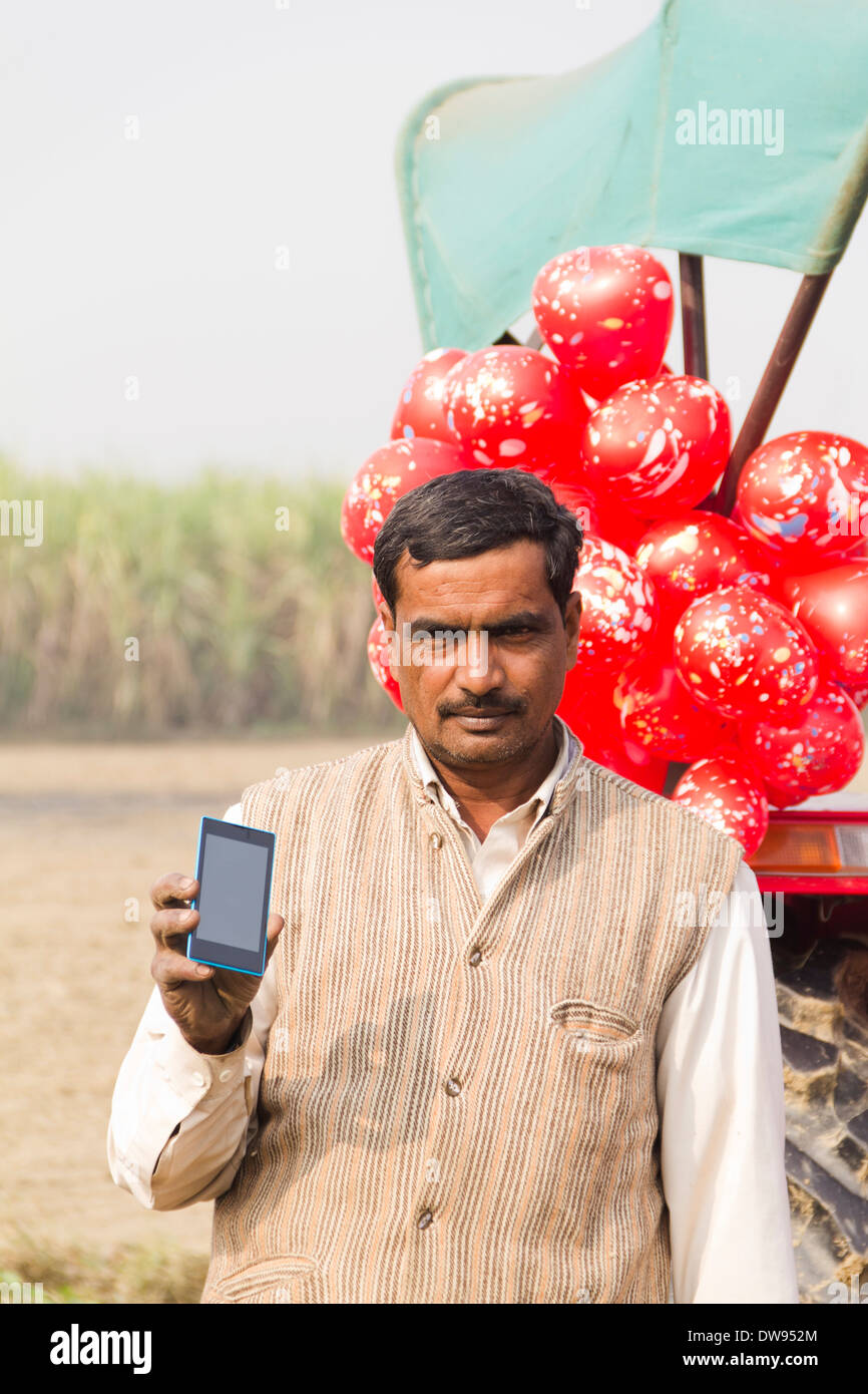 Portrait indian farmer showing tractor hi-res stock photography and ...