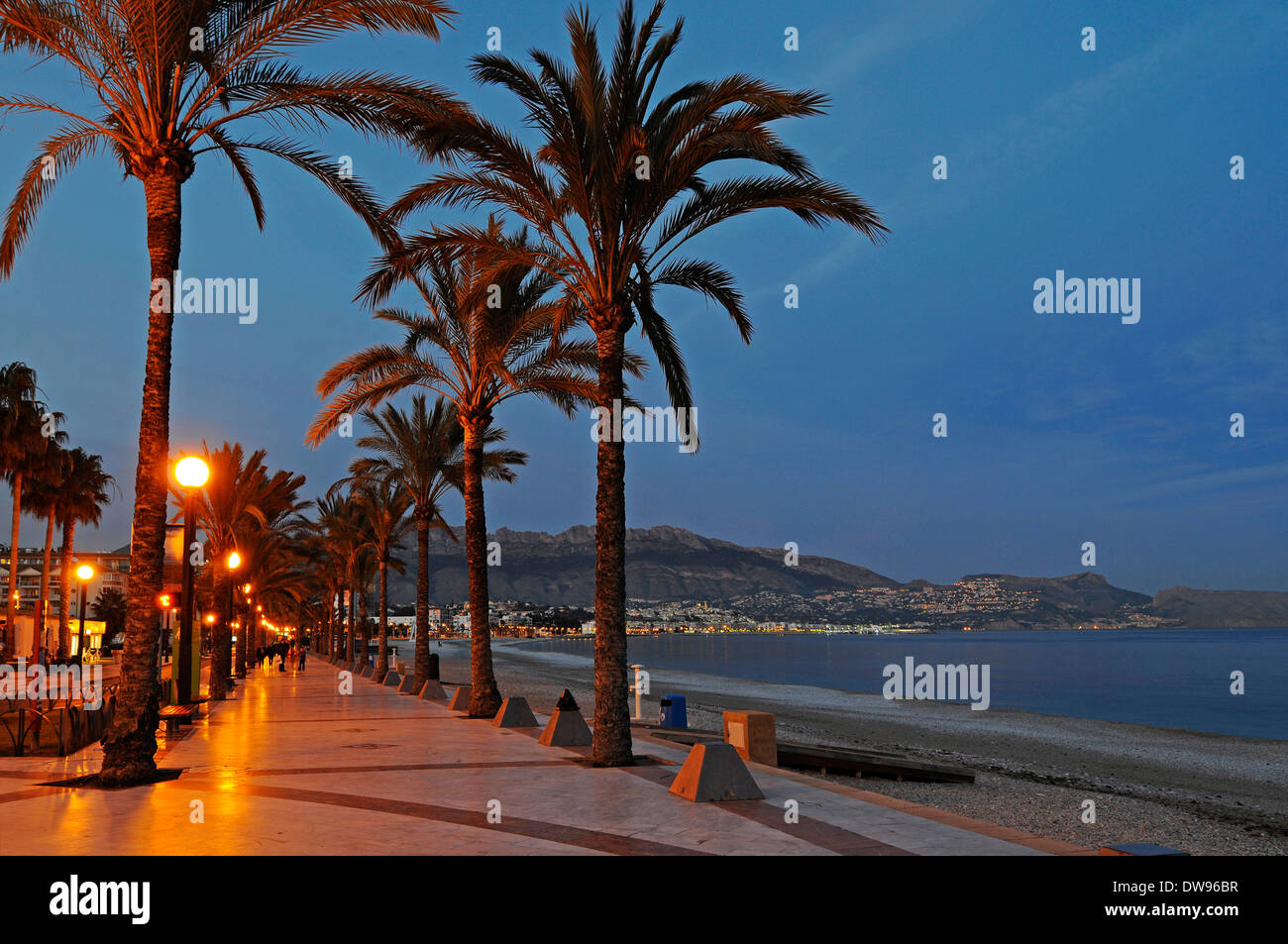 Beach promenade at dusk, Albir, Altea at the back, coast, Costa Blanca ...