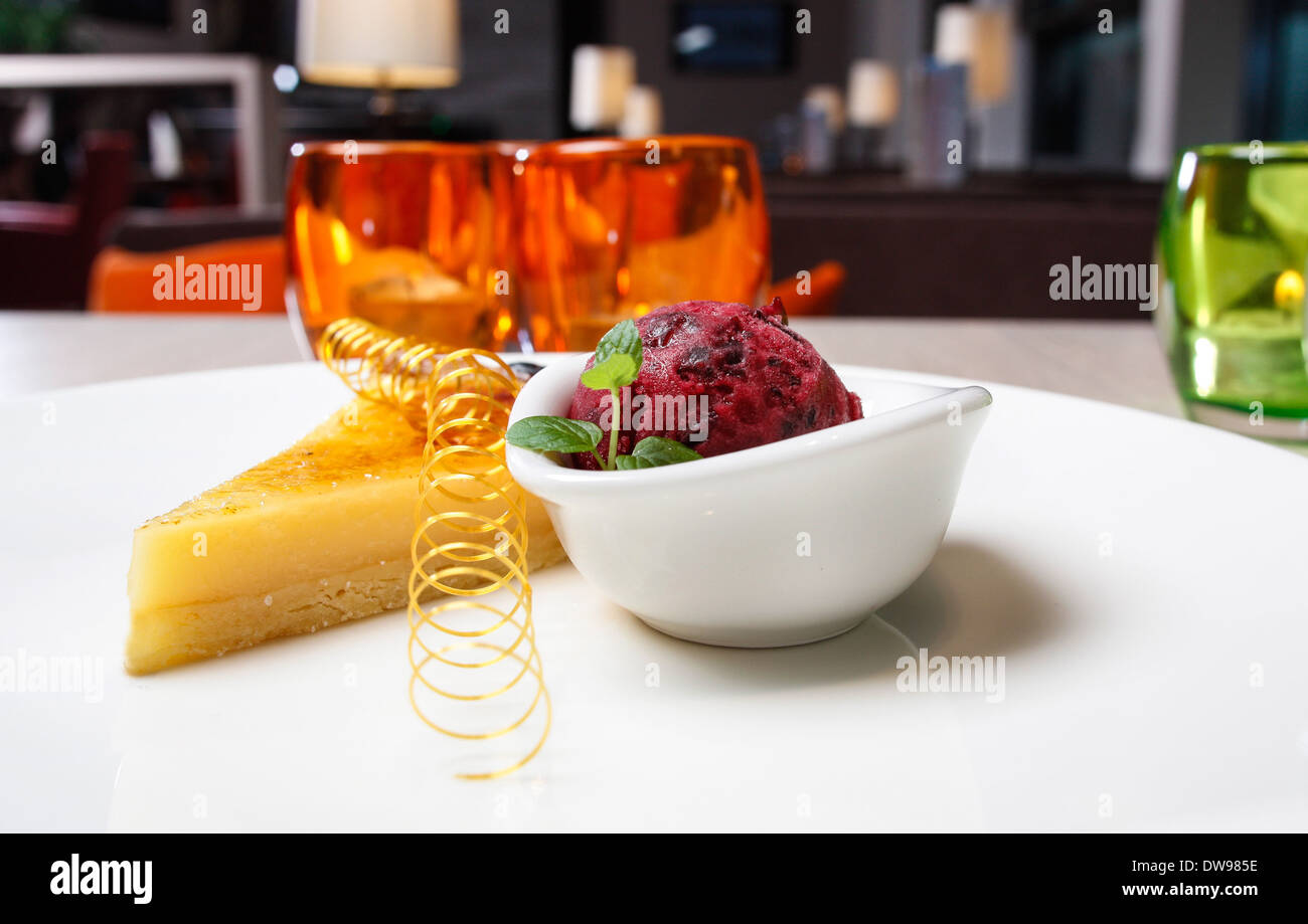 Cheese cake and ice cream - sweet dessert at the restaurantCheese cake ...