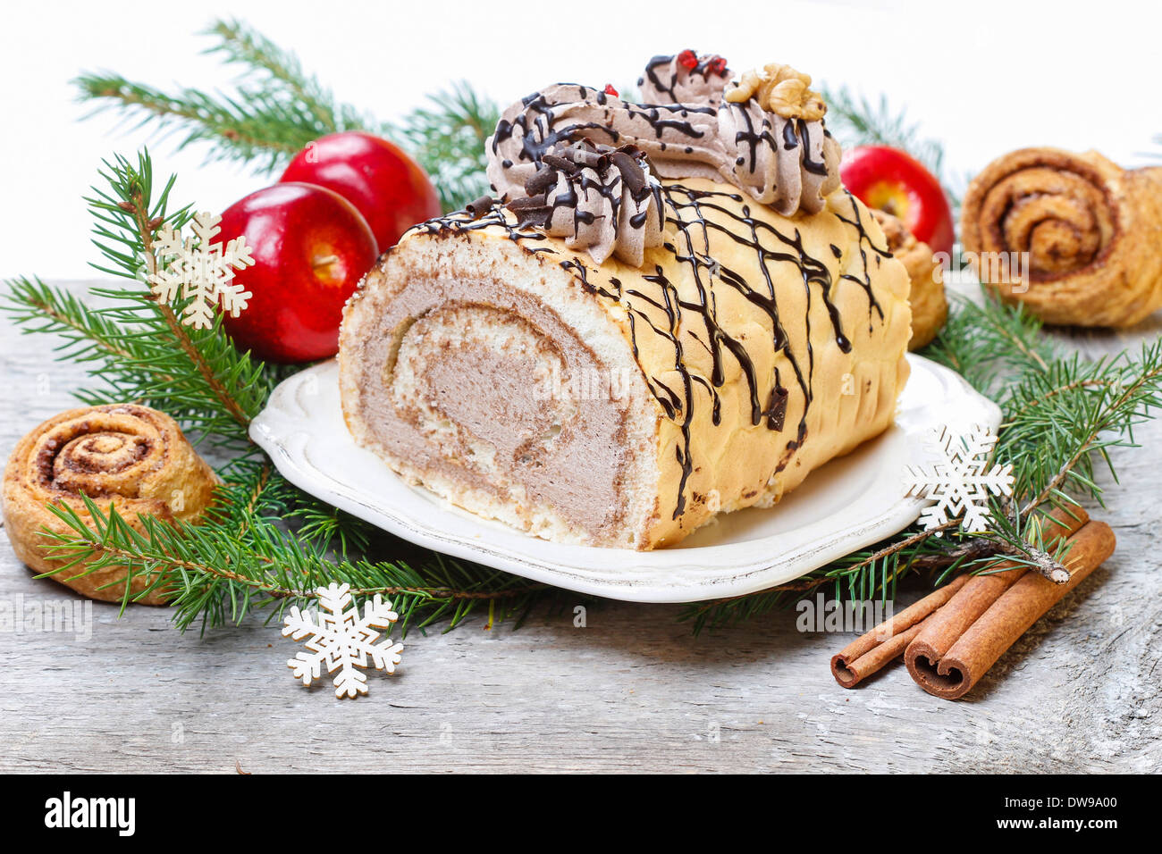 Swiss roll cake in christmas setting apple hi-res stock photography and ...