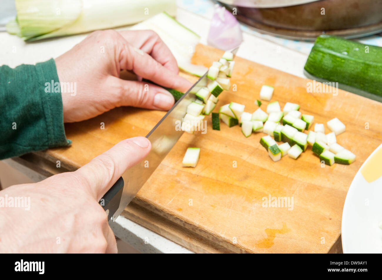 cook cucumber cut into small pieces Stock Photo - Alamy