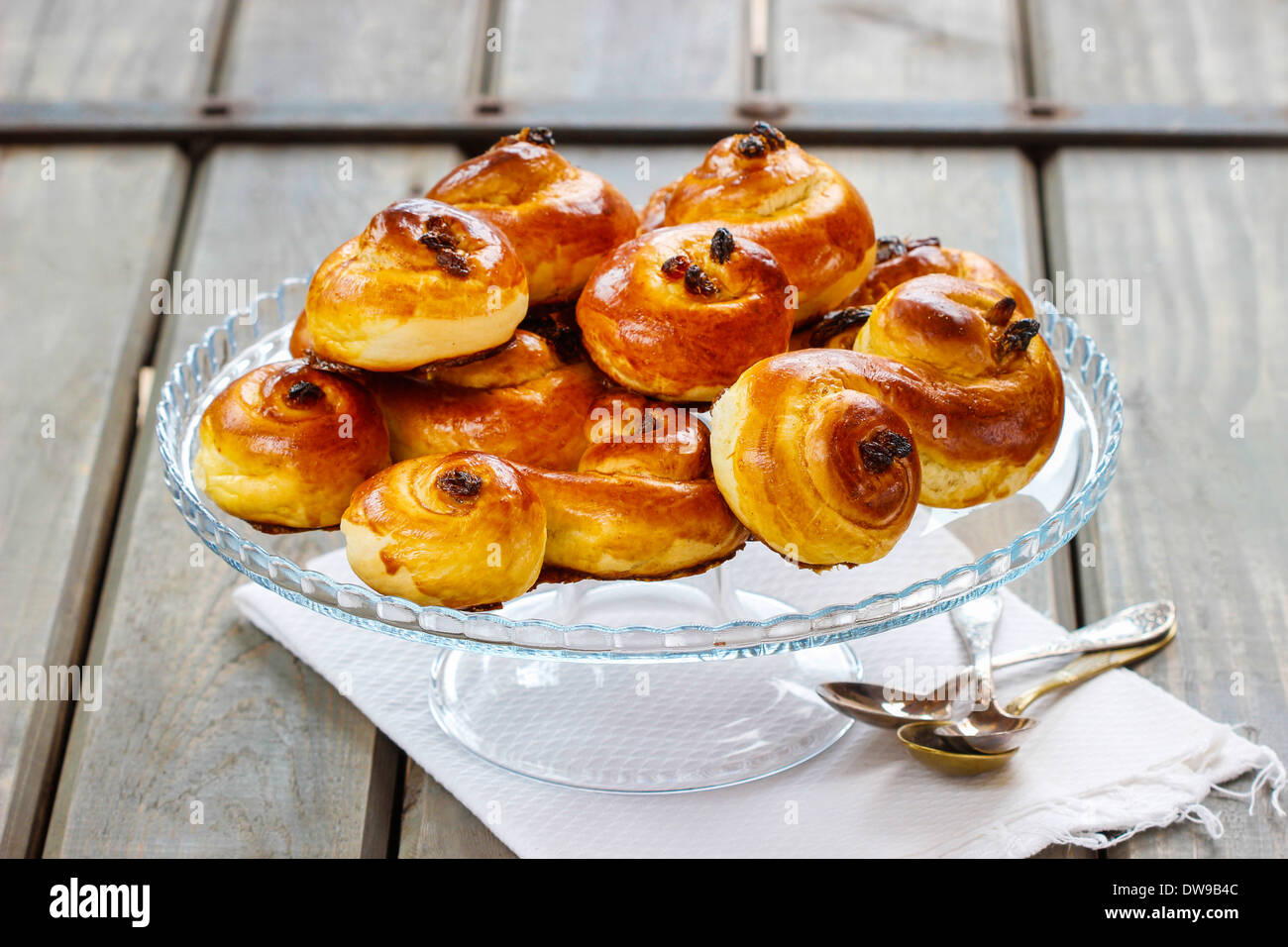 Traditional swedish buns in autumn setting. A saffron bun, lussebulle ...