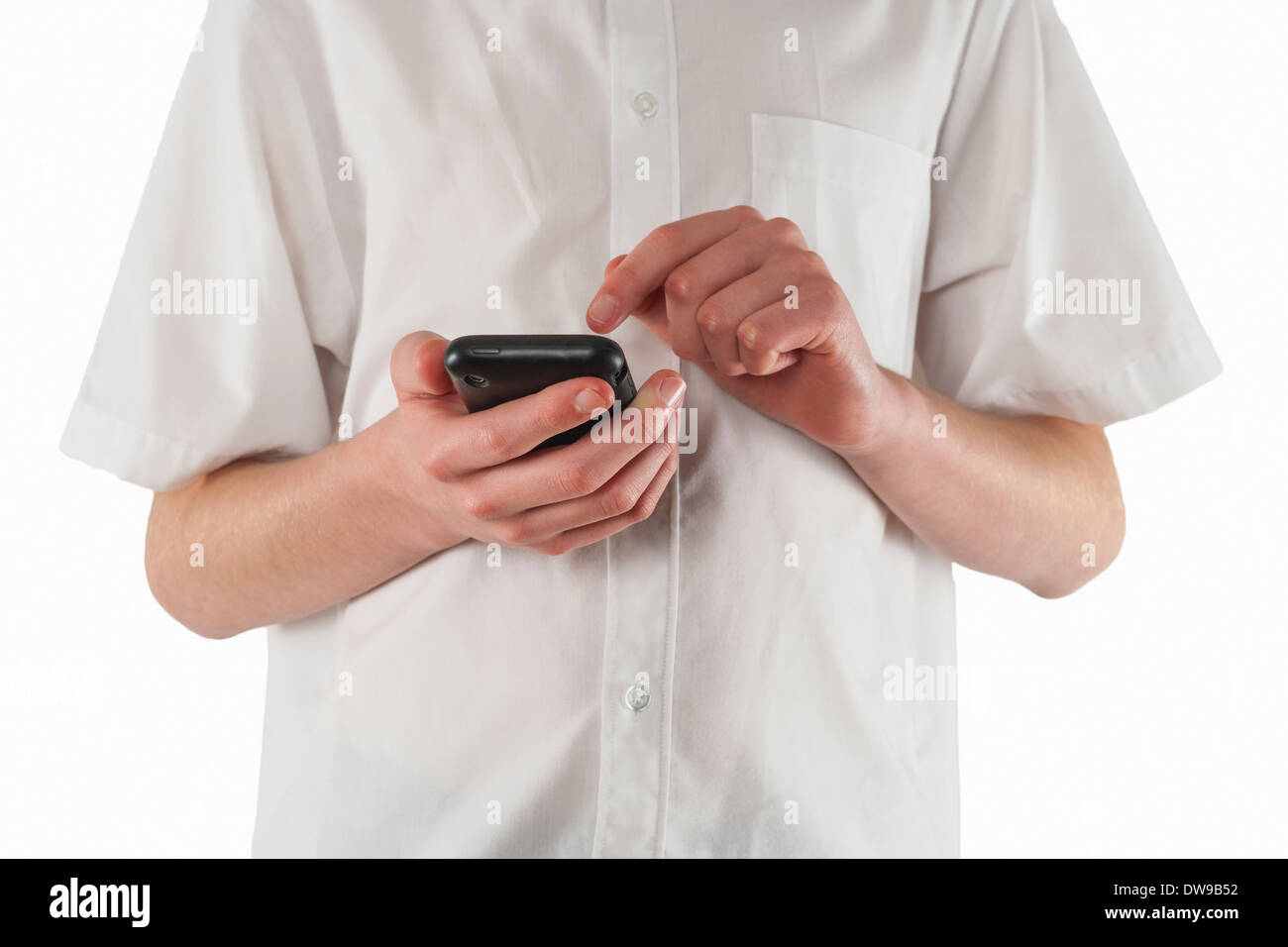 Teen boy texting on mobile hi-res stock photography and images - Alamy
