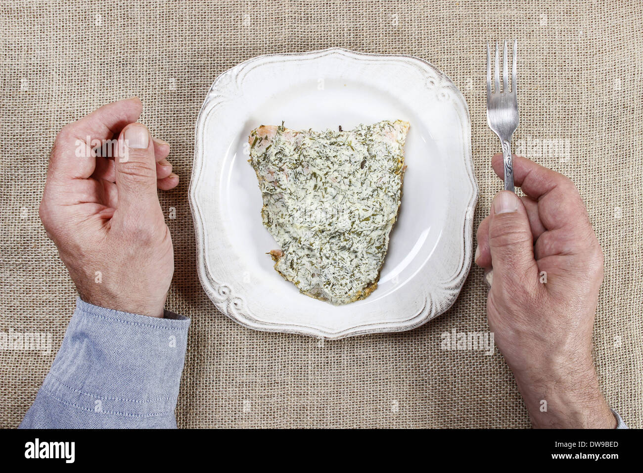 Top view of hungry man over his meal.Top view of hungry man over his ...