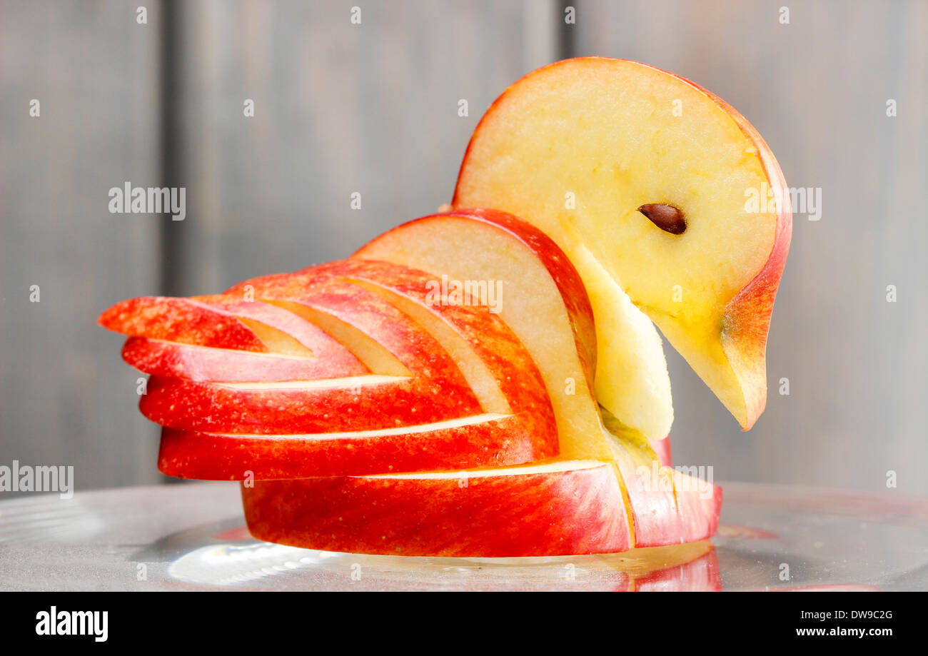 Apple swan. Decoration made of fresh fruit.Apple swan. Decoration made ...