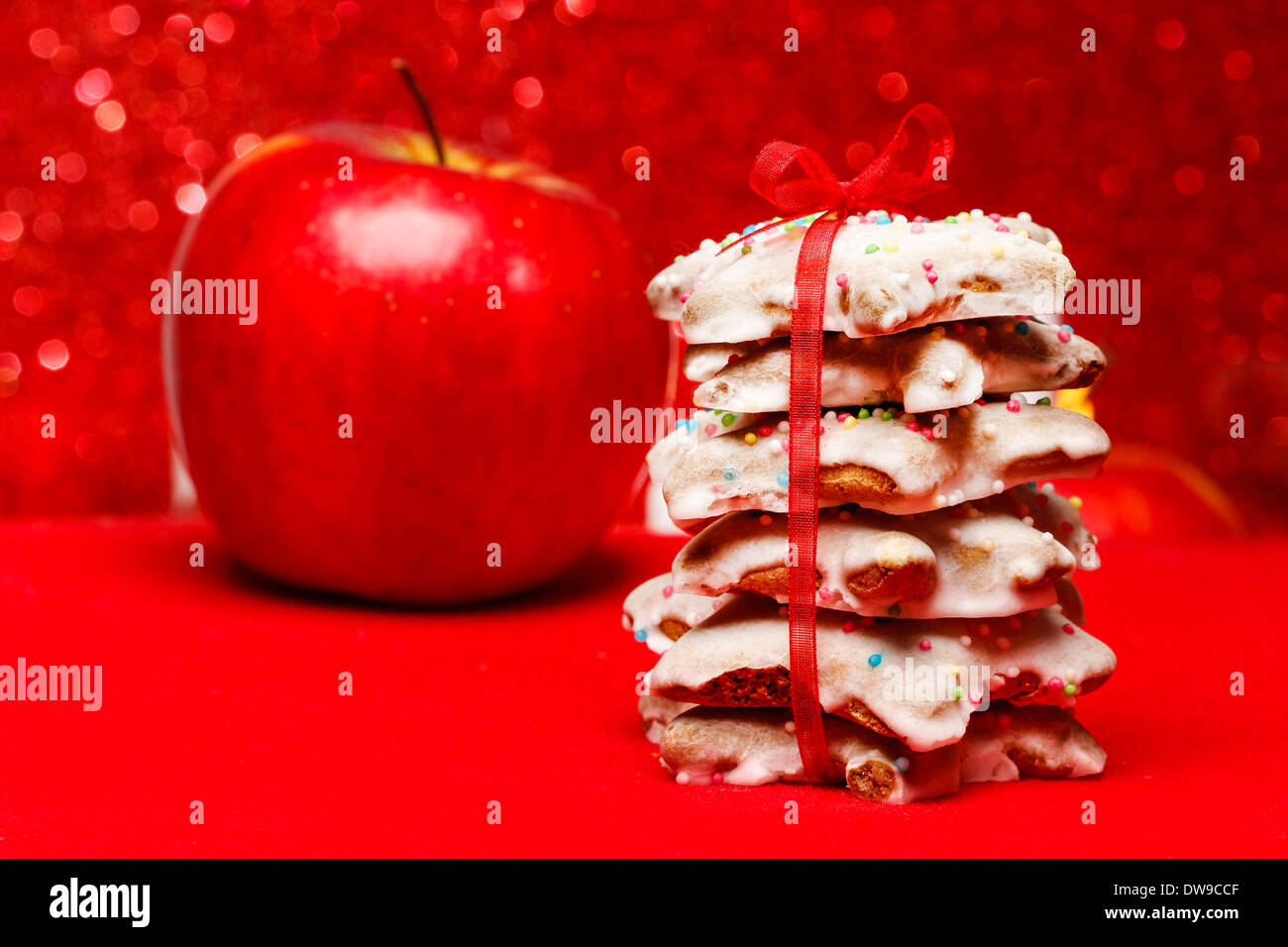 Stack of gingerbread cookies in star shape on red backgroundStack of ...