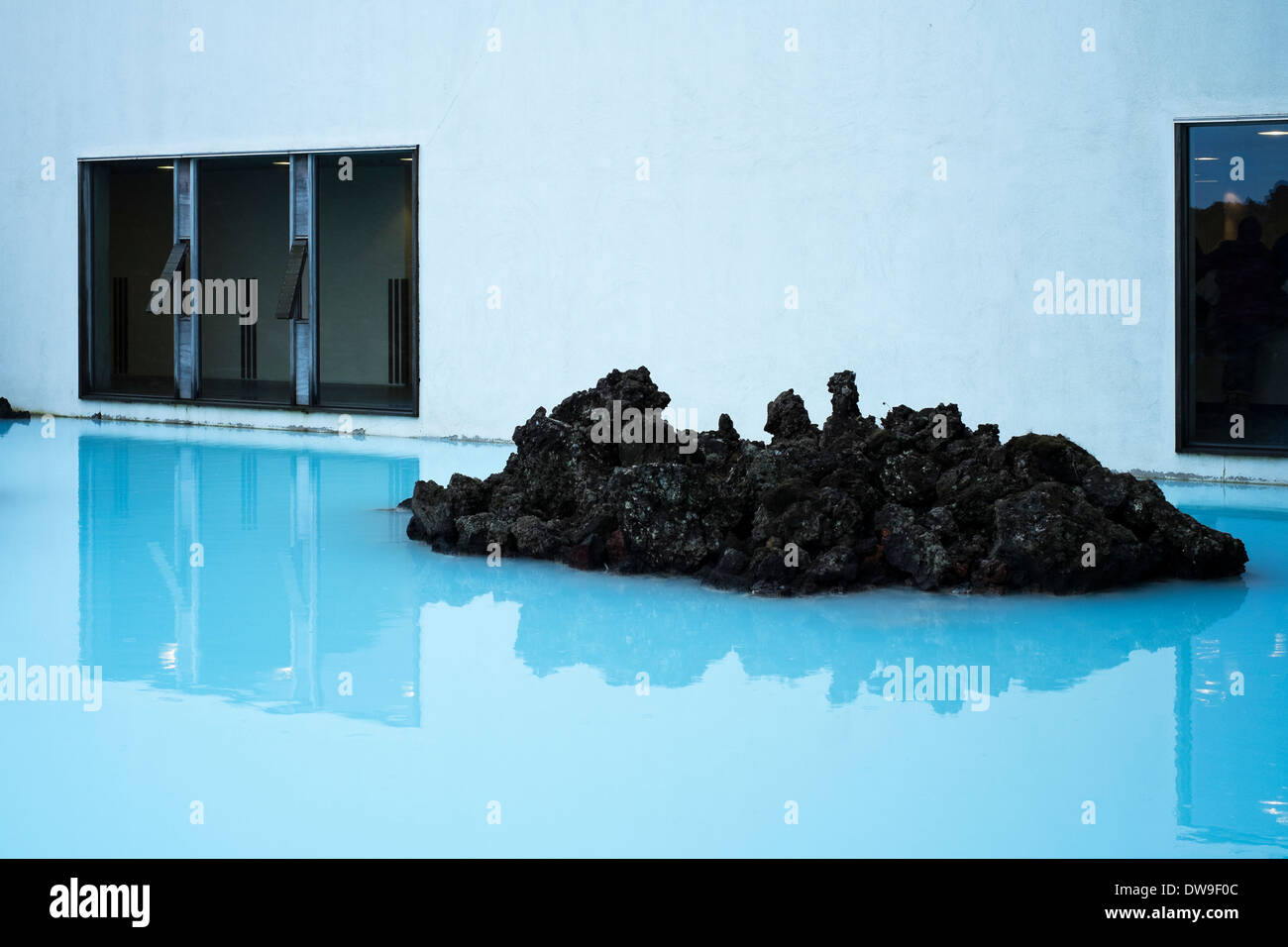 A piece of lava in the pool at the entrance to the Blue Lagoon resort ...