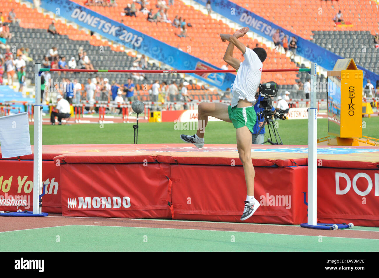 Athlete takes part in high jumping during the 2013 IAAF World Junior ...