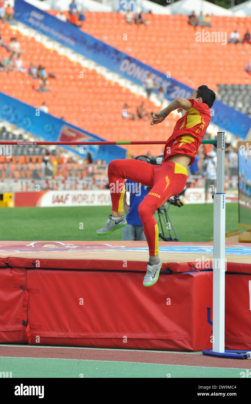 Athlete takes part in high jumping during the 2013 IAAF World Junior ...