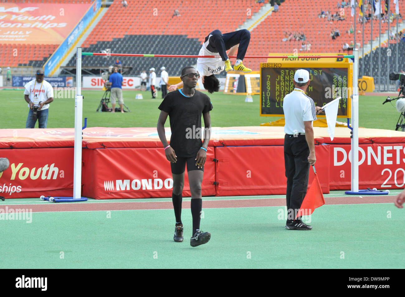 Athlete takes part in high jumping during the 2013 IAAF World Junior ...