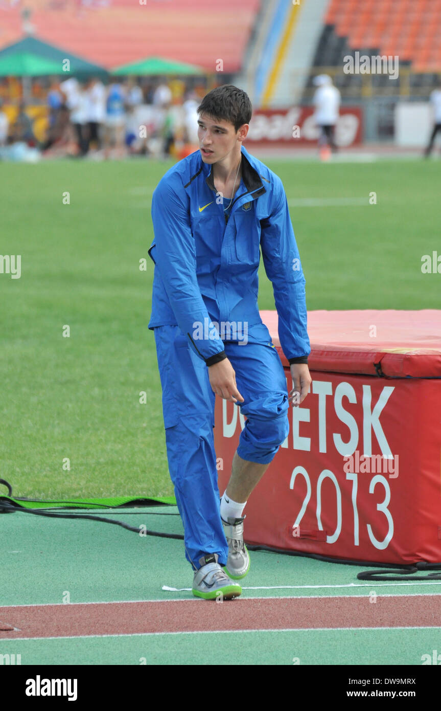 Athlete takes part in high jumping during the 2013 IAAF World Junior ...