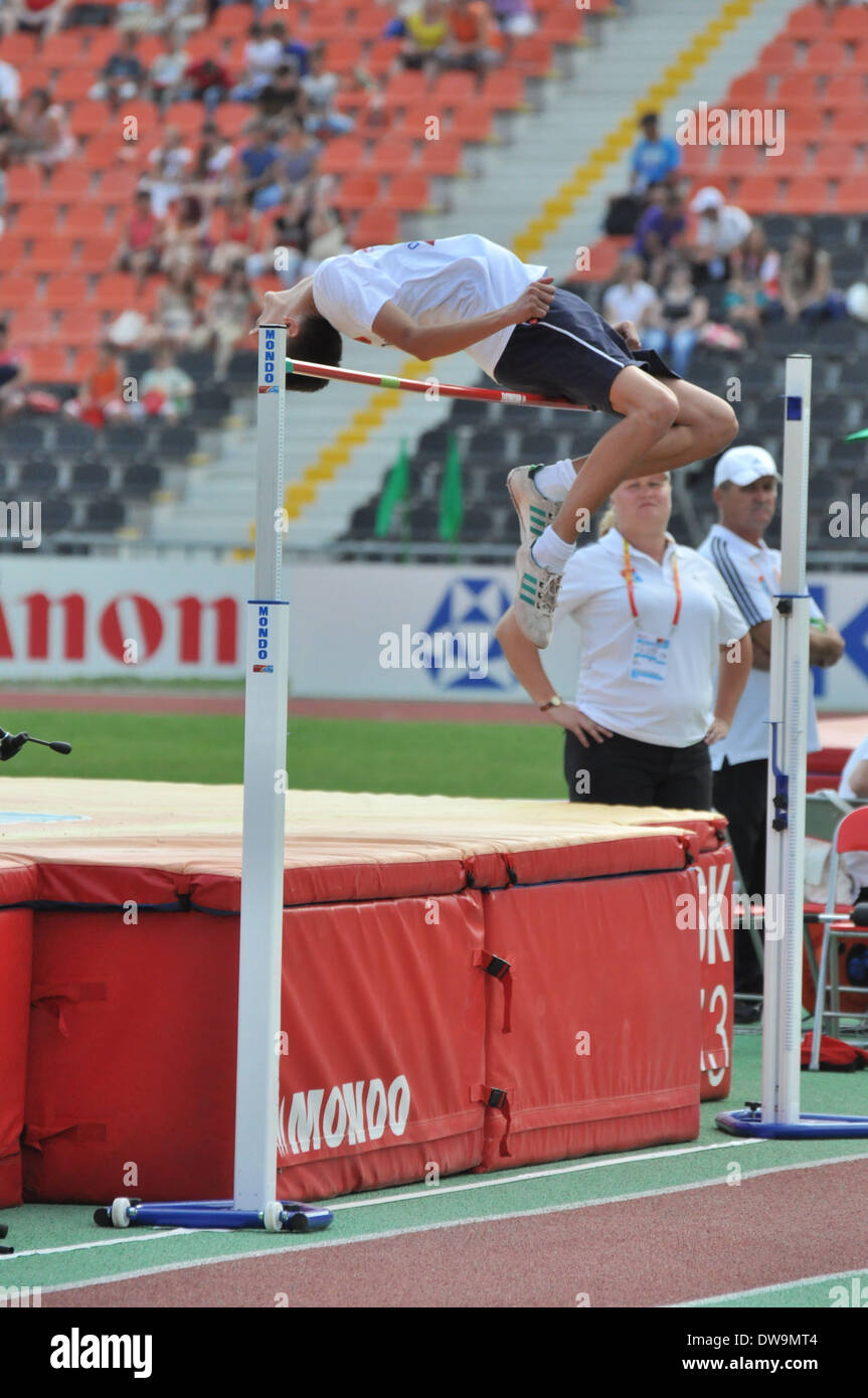 Athlete takes part in high jumping during the 2013 IAAF World Junior ...