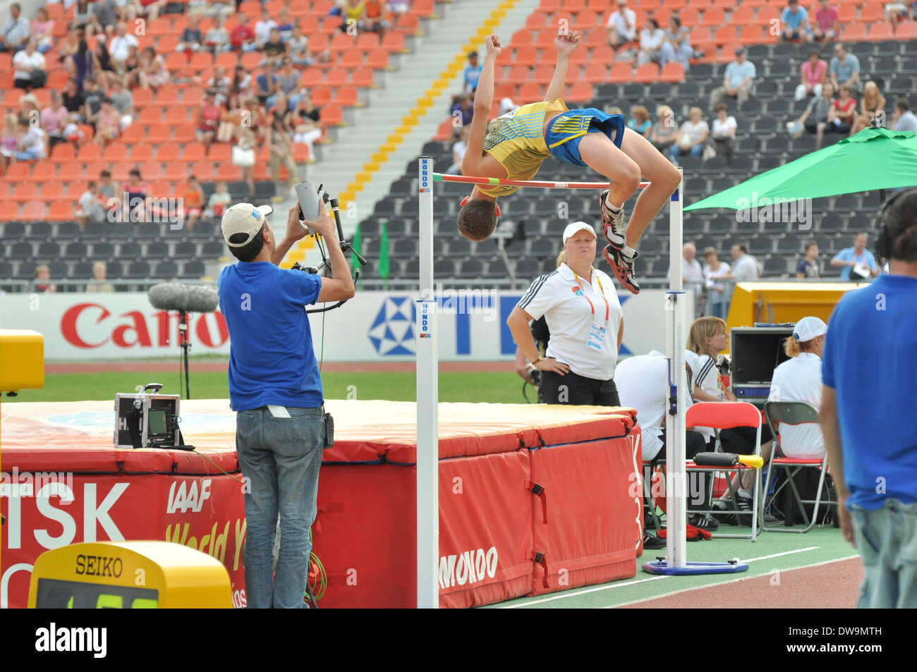 Athlete takes part in high jumping during the 2013 IAAF World Junior ...